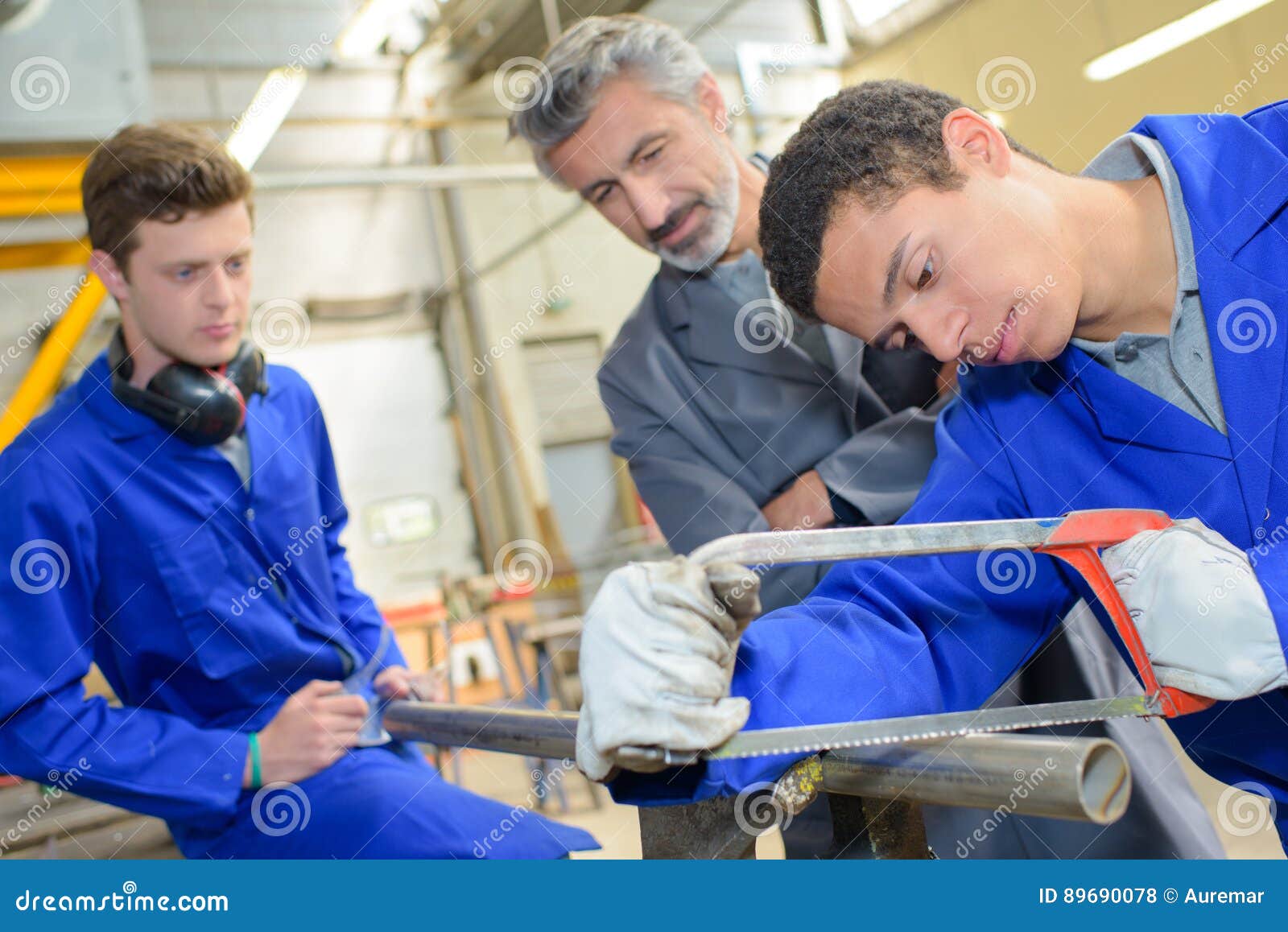 Apprentice Learning To Use Bow Saw Stock Photo - Image of work ...