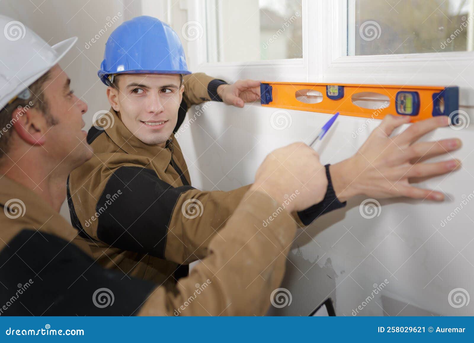 Apprentice Learning To Use Spirit Level Stock Image - Image of ...