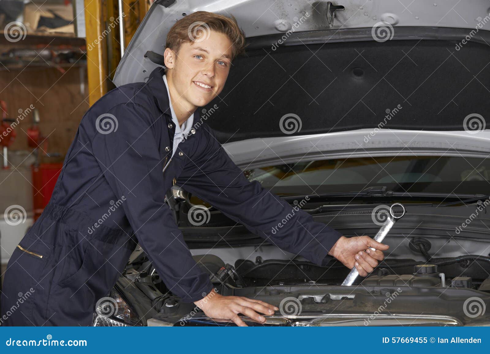 Apprentice Mechanic in Auto Shop Working on Car Engine Stock Image ...