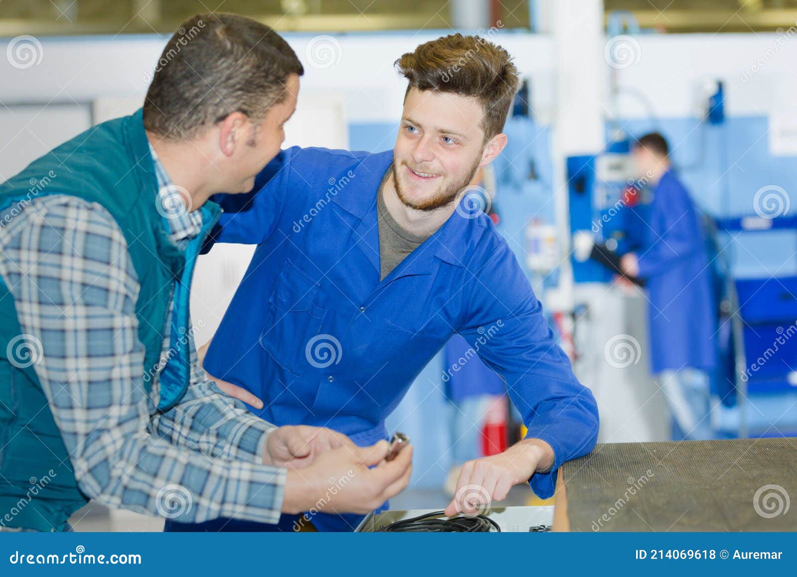 Apprentice Mechanic Working in Auto Repair Shop Stock Photo - Image of ...