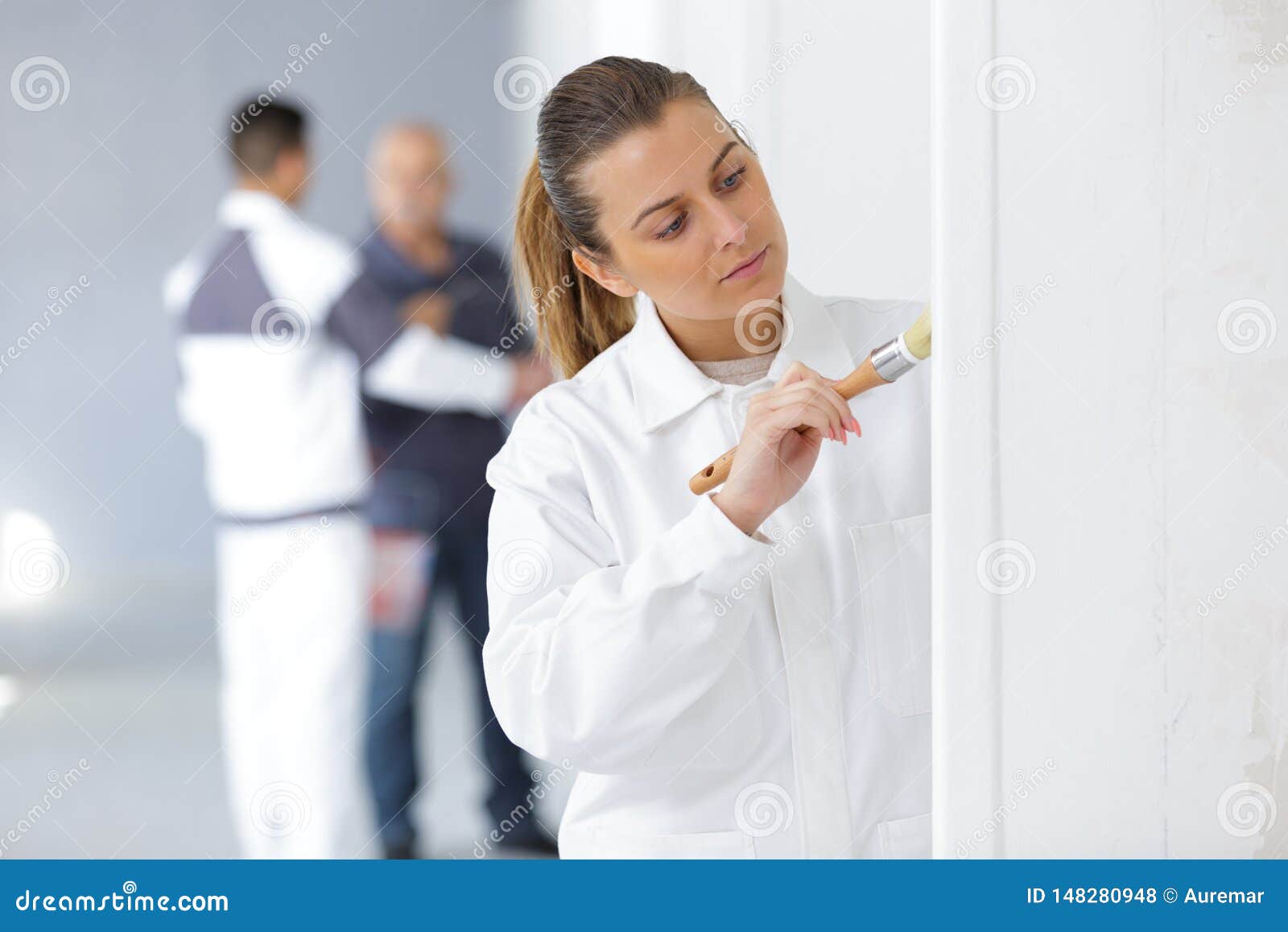 Apprentice Painter Practicing on Wall Stock Photo - Image of vocation ...