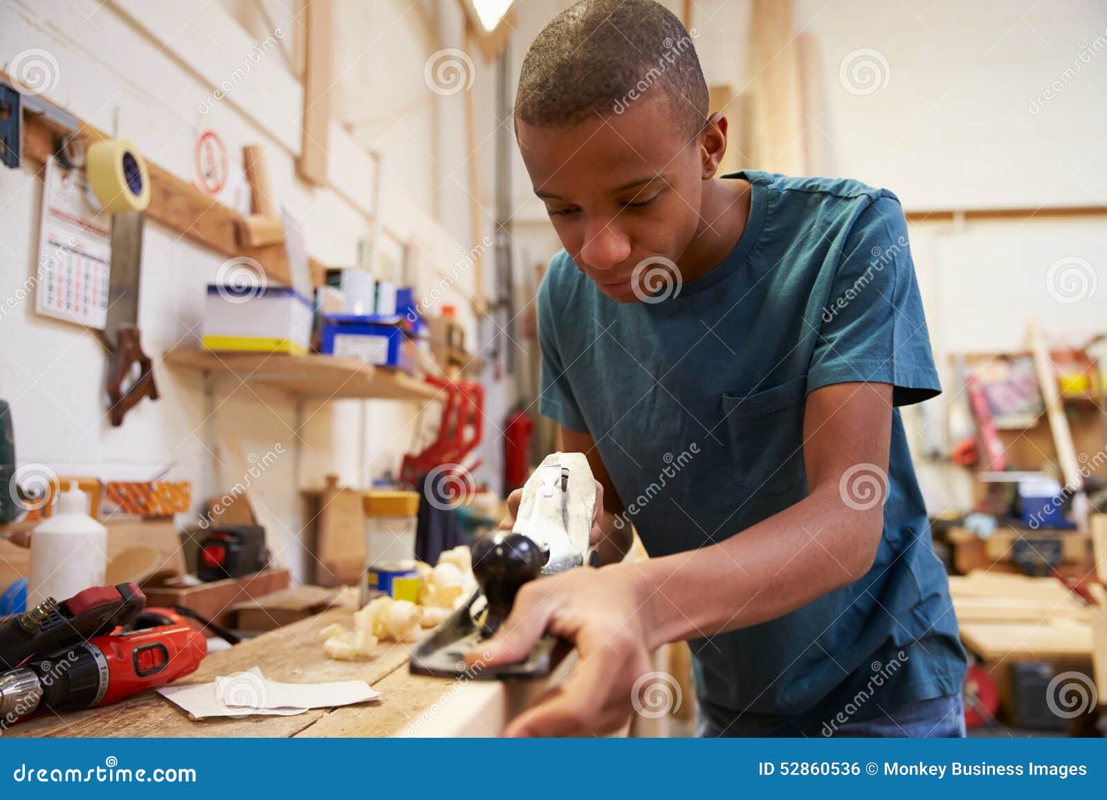 Apprentice Planing Wood in Carpentry Workshop Stock Photo - Image of ...
