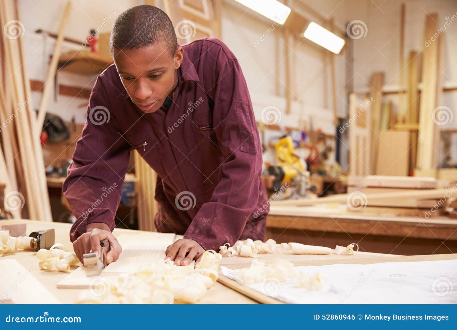 Apprentice Planing Wood in Carpentry Workshop Stock Photo - Image of ...