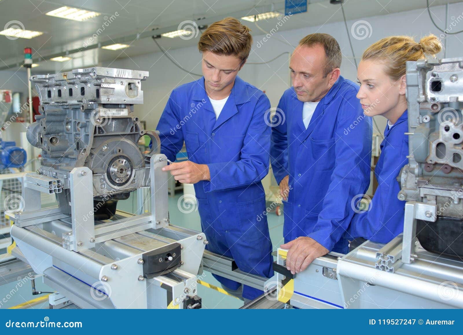 Apprentice Setting Up Machinery Stock Image - Image of caucasian ...