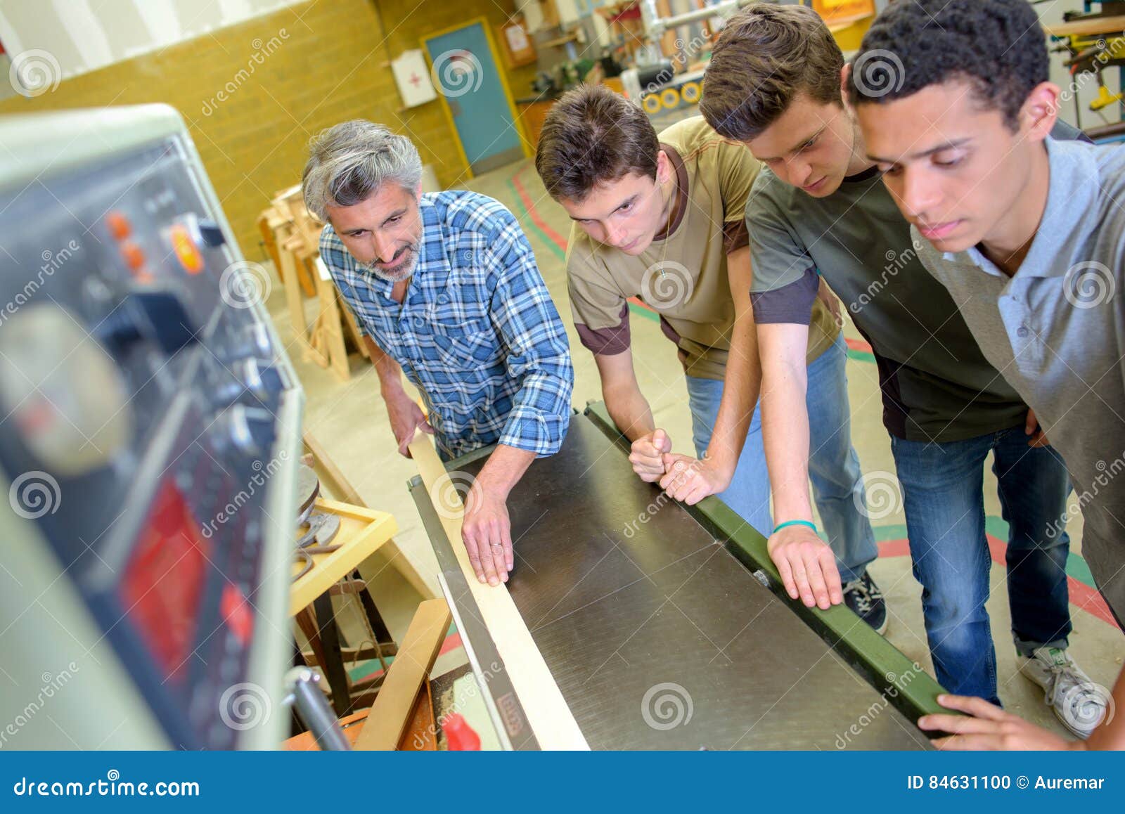 Apprentice and Teacher in Workshop Stock Photo - Image of teenager ...