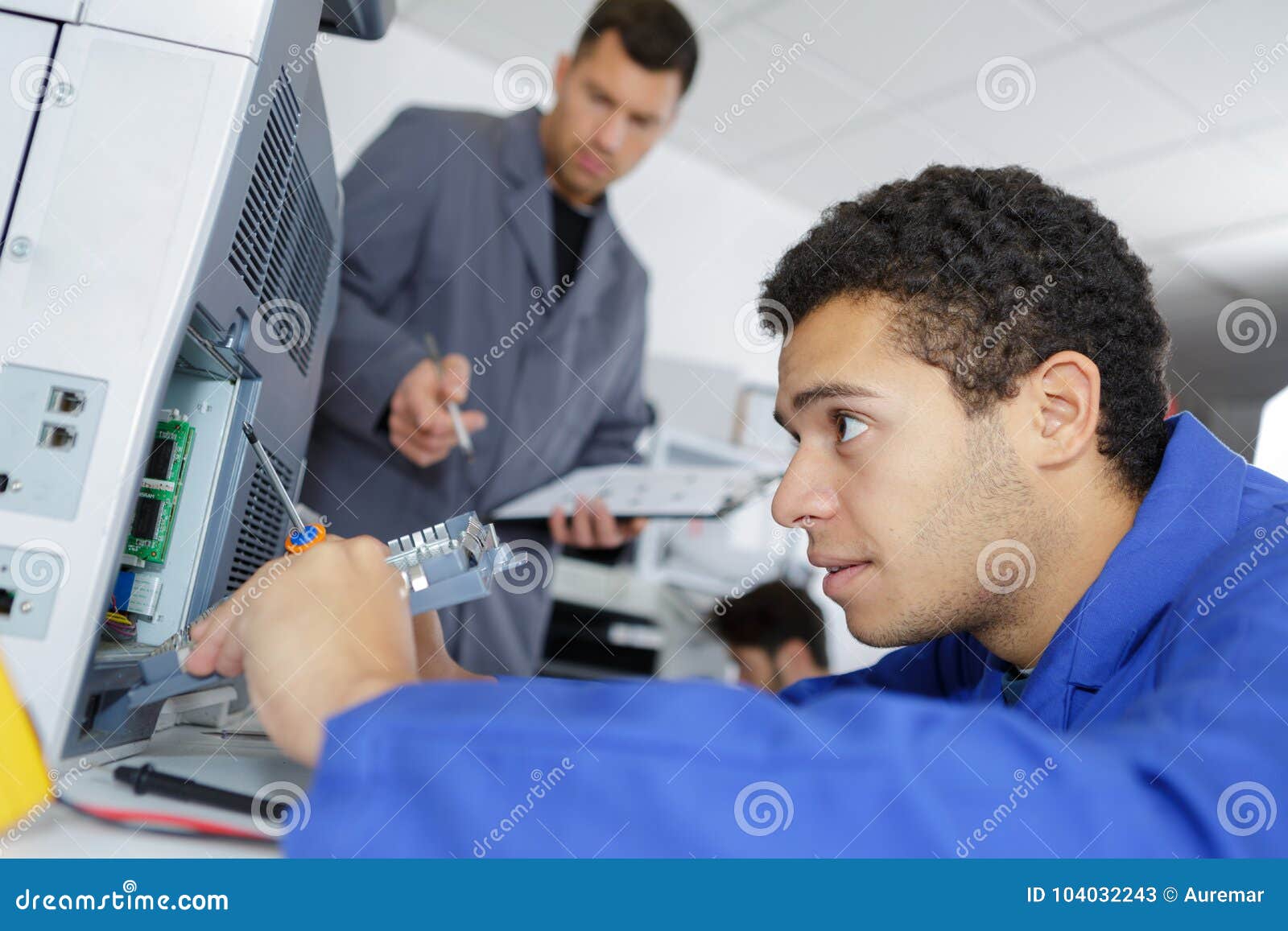 Apprentice Technician Repairing Printer at Business Place at Work Stock Image - Image of male ...