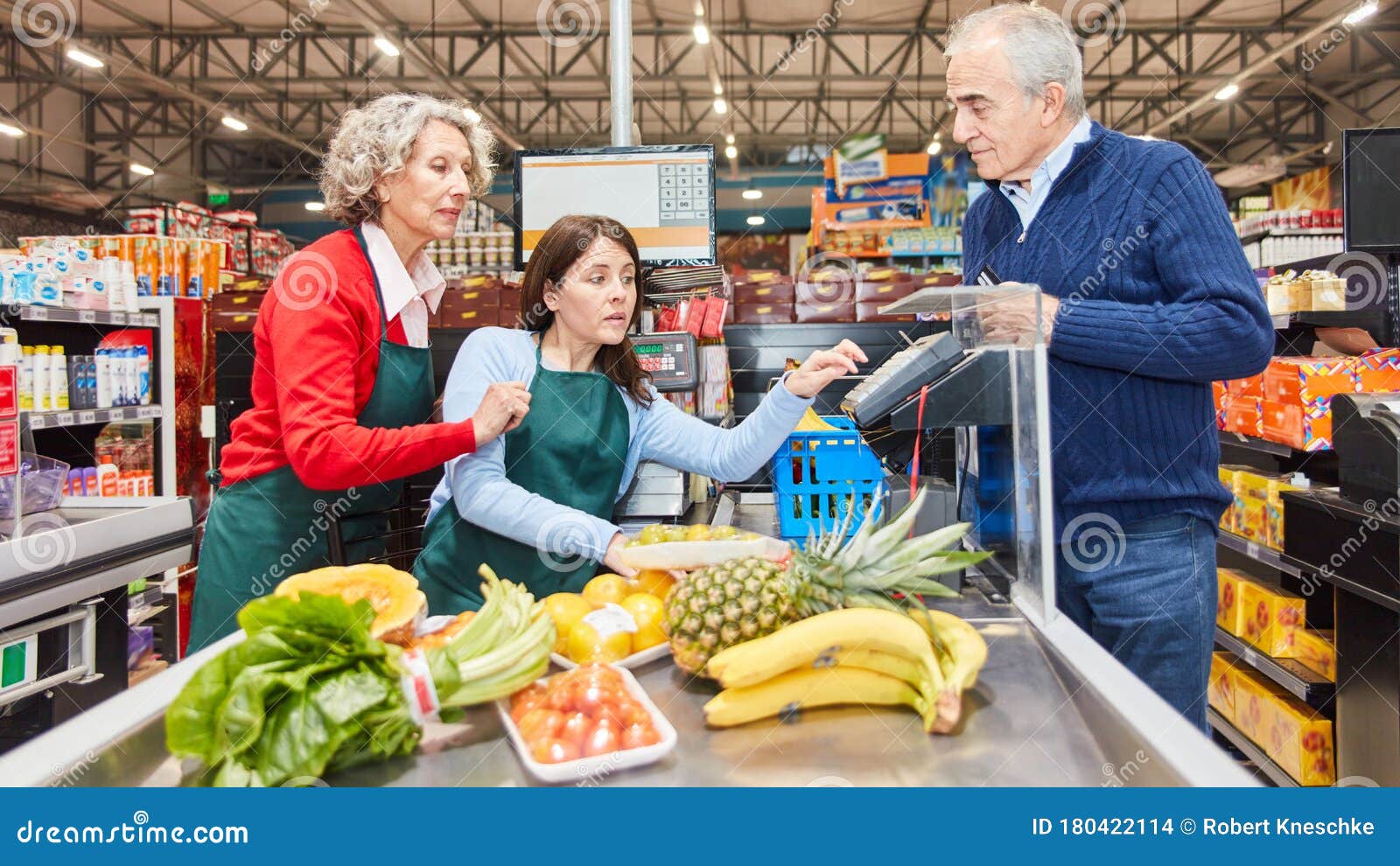 Apprentice or Trainee at the Supermarket Cashier Stock Photo - Image of ...