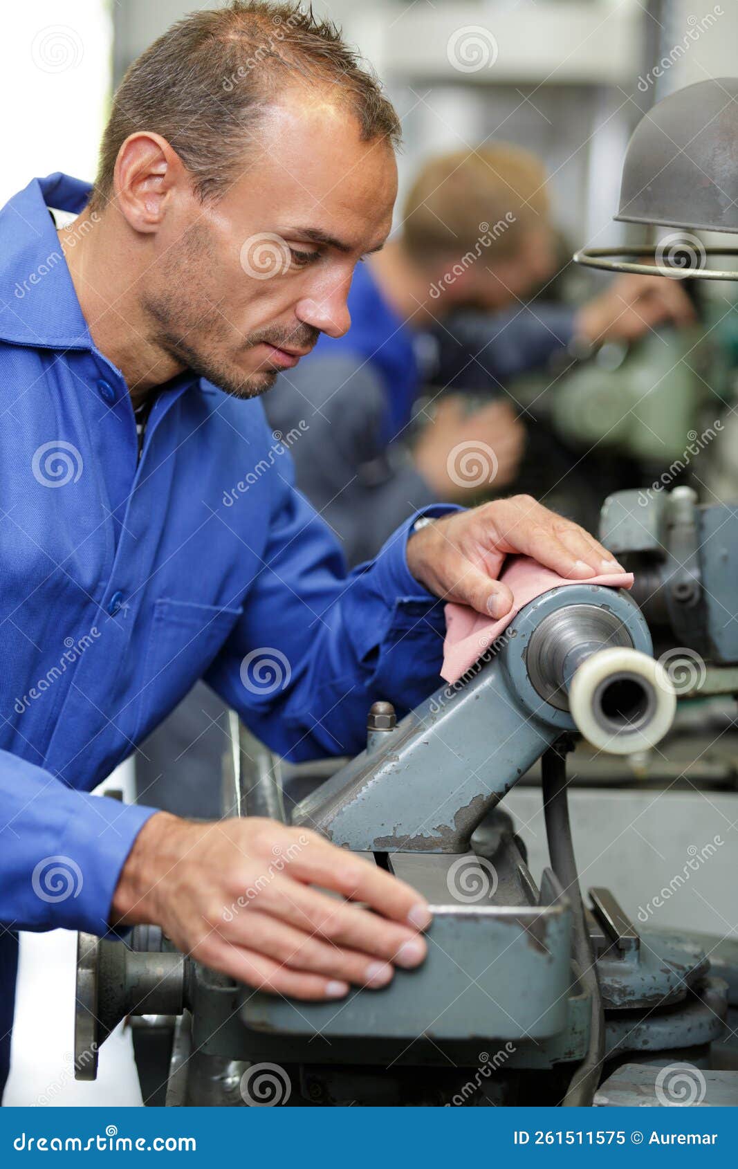 Apprentice Using Machinery in Factory Stock Image - Image of people ...