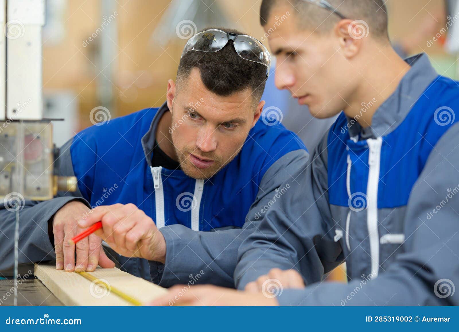 Apprentice Watching Tutor Using Bench Saw Stock Photo - Image of safety ...