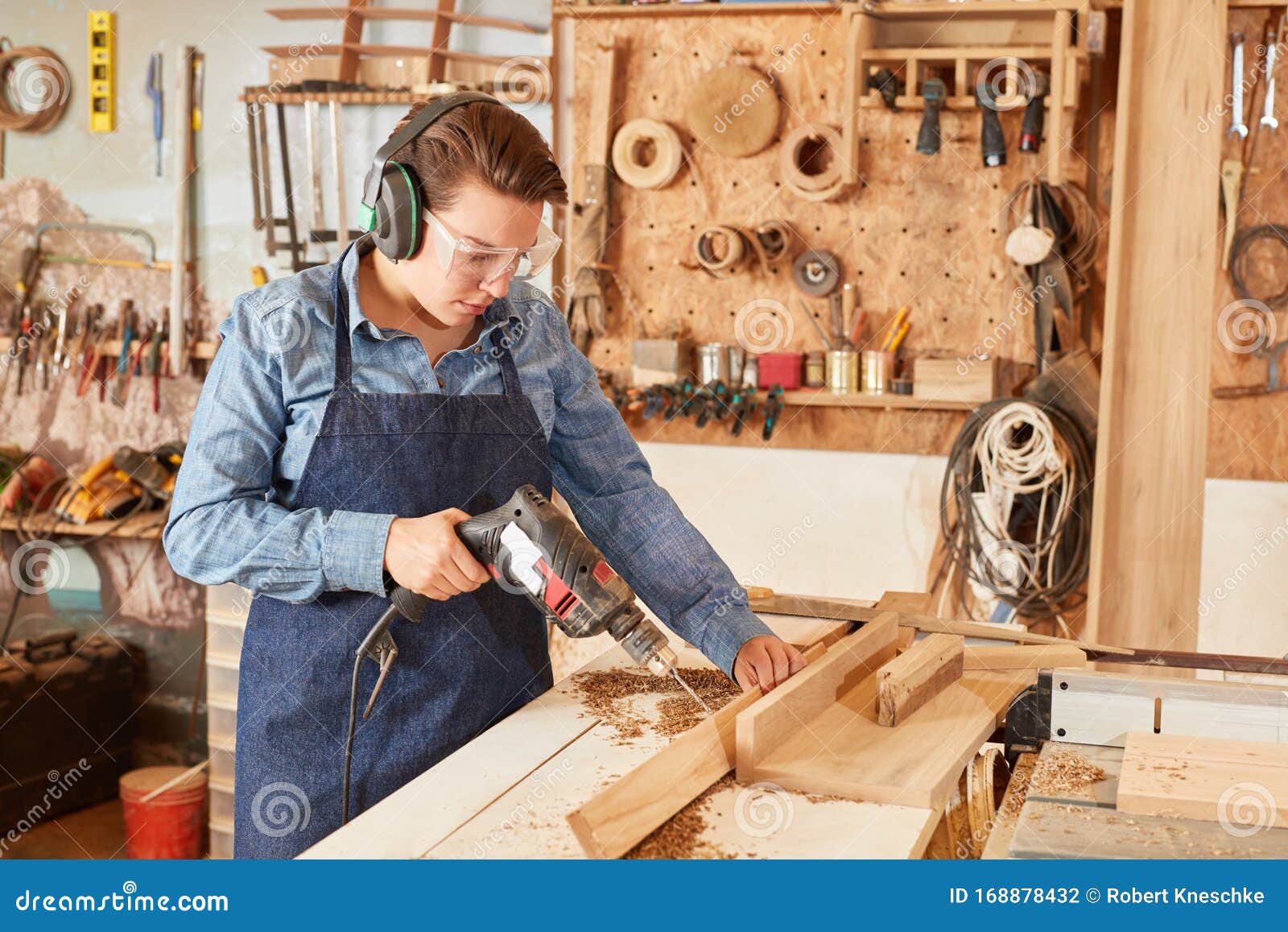 Apprentice Works with a Drill Stock Photo - Image of drill, hand: 168878432