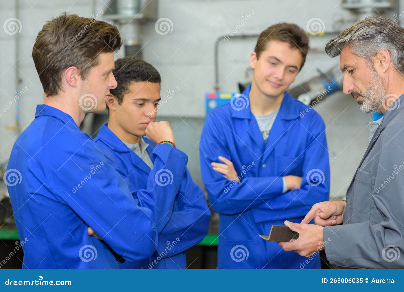 Apprentices - Men in Overalls Stock Image - Image of handsome, interns ...