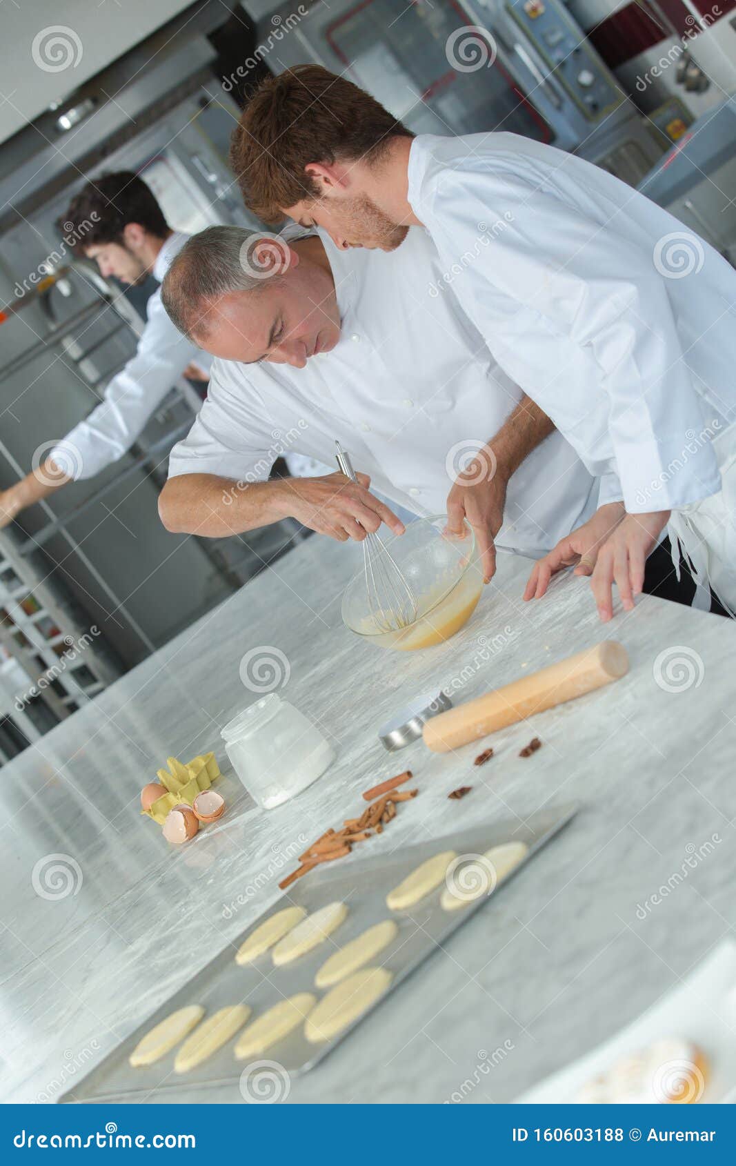 Apprentices in Pastry Learning with Experienced Chef Stock Photo ...