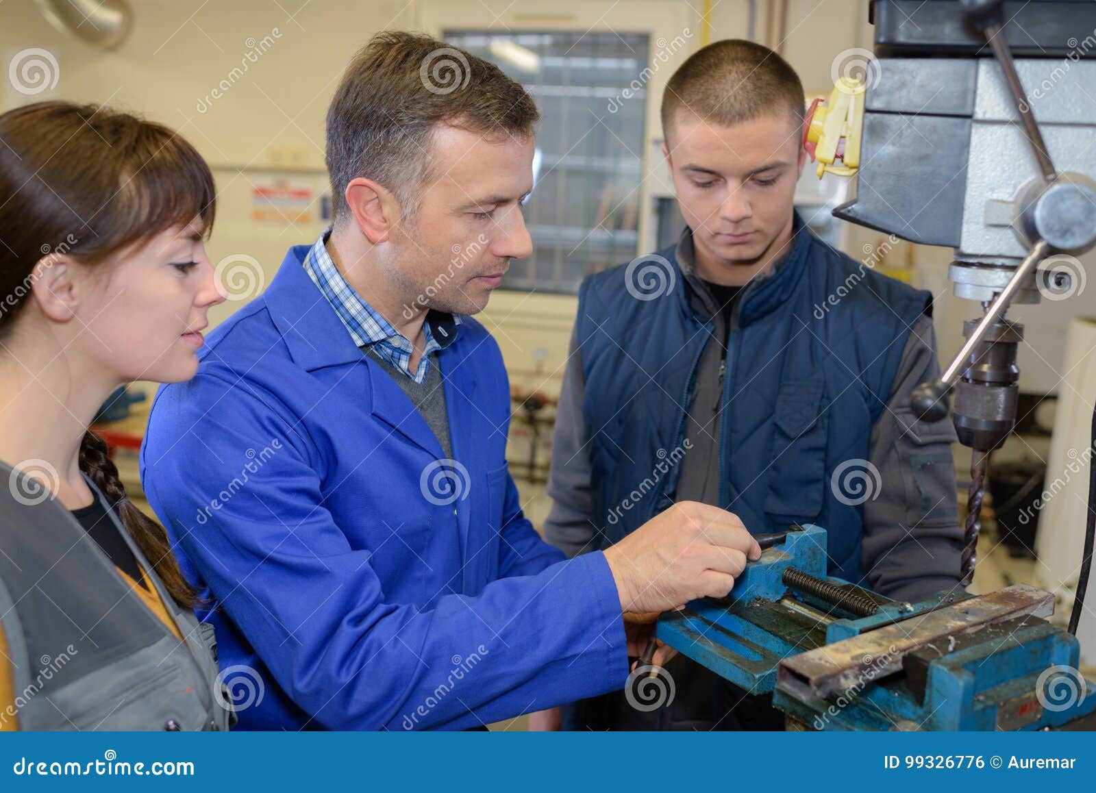 Apprentices Working on Machine - Metal Processing Stock Photo - Image ...