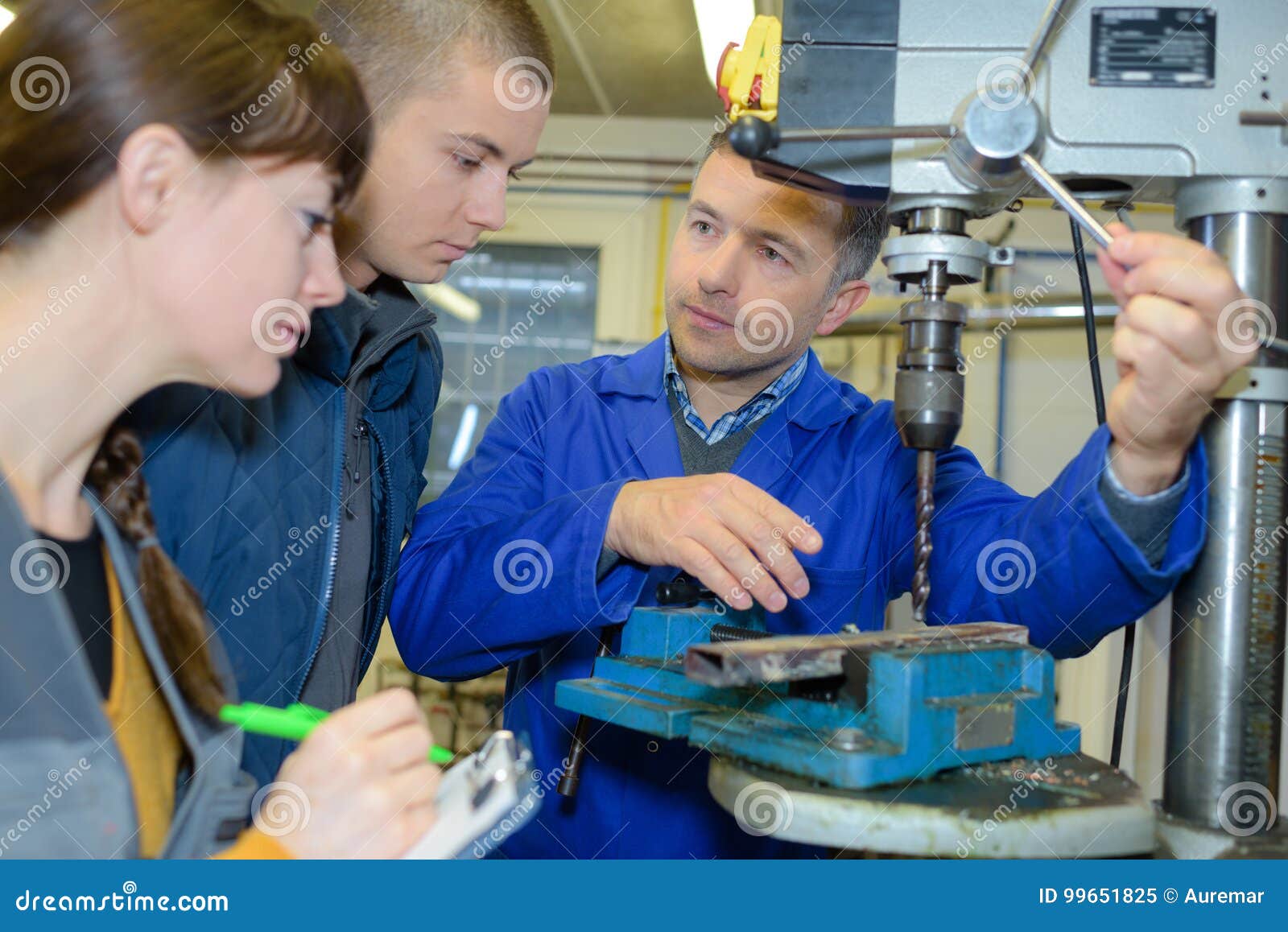 Apprentices Working on Machine - Metal Processing Stock Image - Image ...