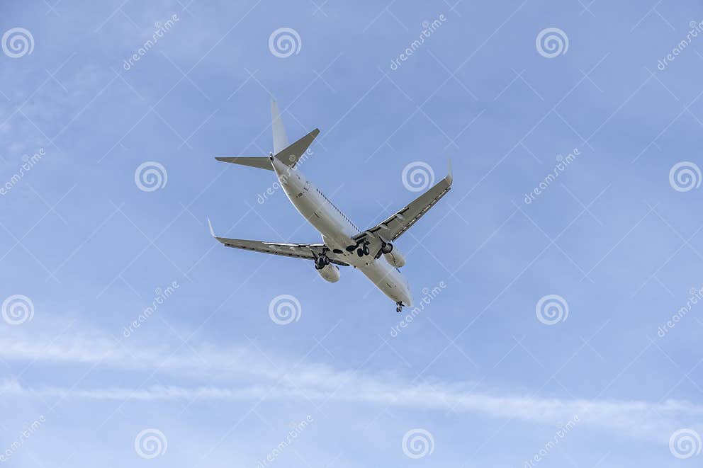 The Approach of a Jet Plane Flying at Low Altitude Stock Image - Image ...