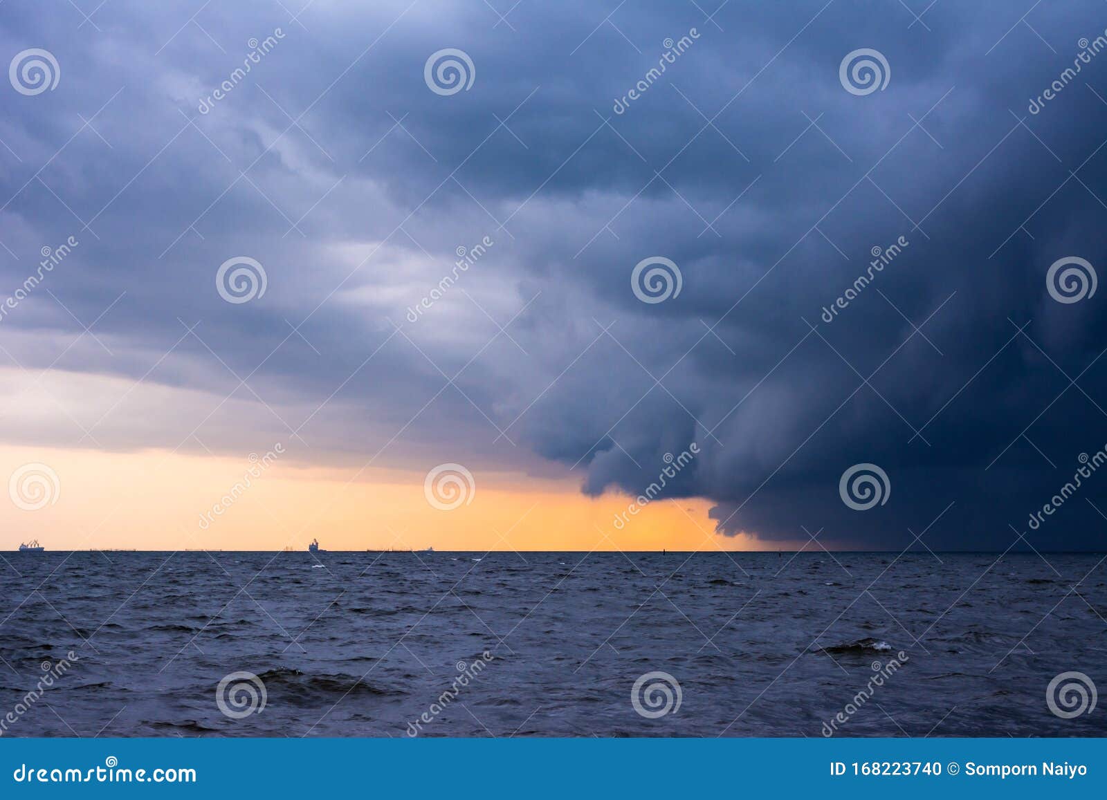 Approaching Storm Cloud with Rain Over the Sea Stock Photo - Image of ...