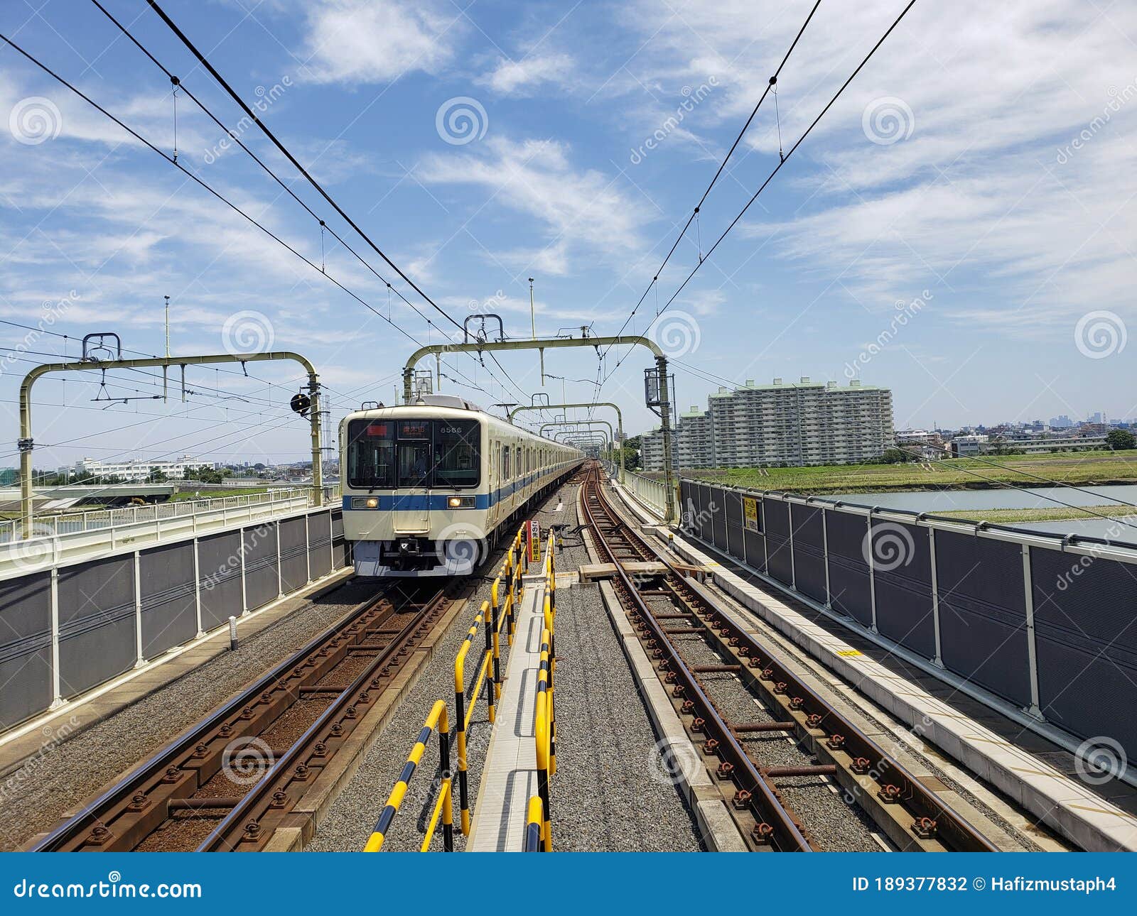 Approaching Train With Passengers Waiting On Hong Kong MTR Platform ...