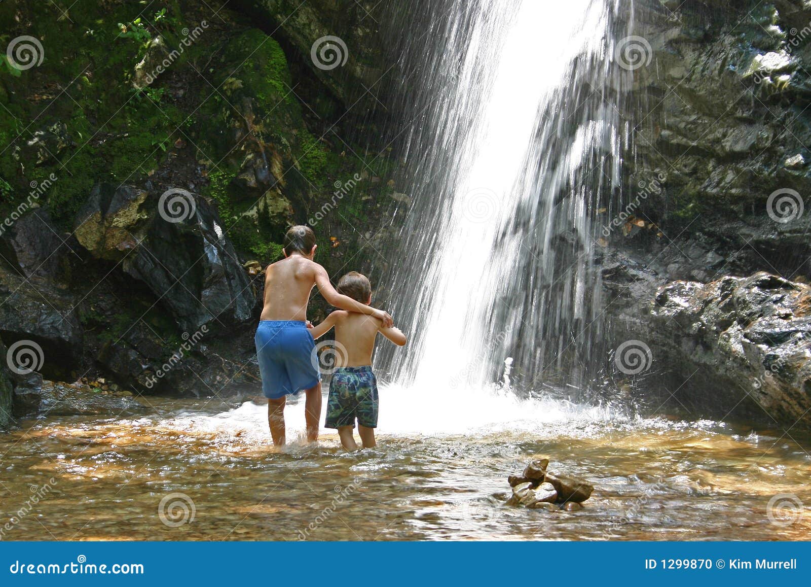 Approaching the waterfall stock photo. Image of male, children - 1299870