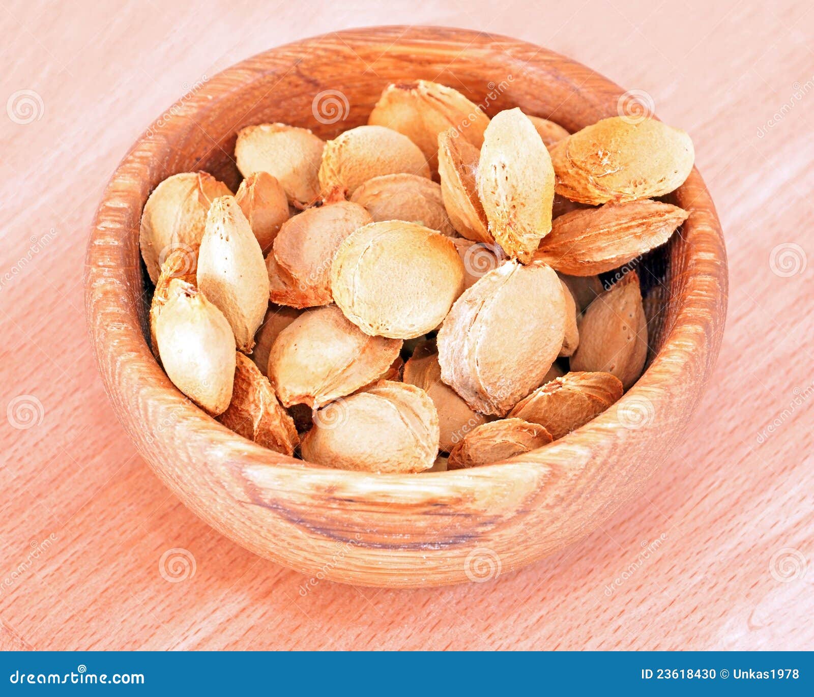 Apricot Stone in Wooden Bowl Stock Photo - Image of health, dish: 23618430