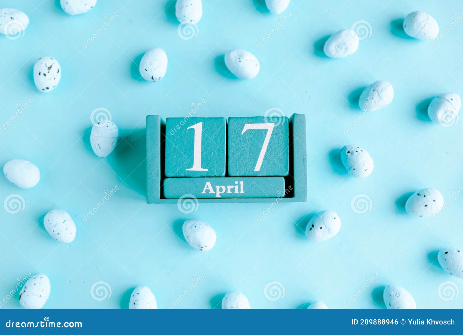 April 17. Blue Cube Calendar with Month and Date on Blue Background ...