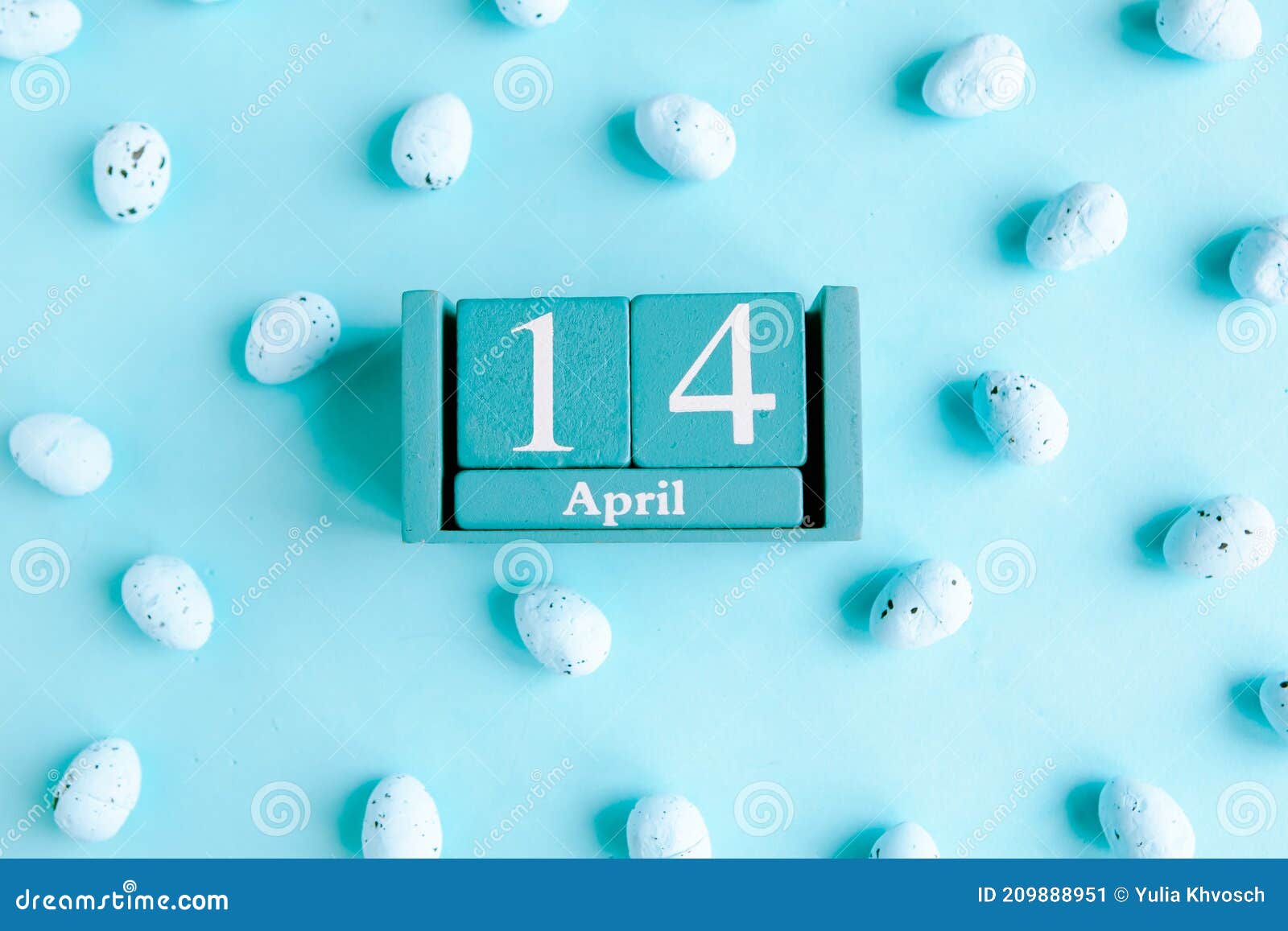 April 14. Blue Cube Calendar with Month and Date on Blue Background ...
