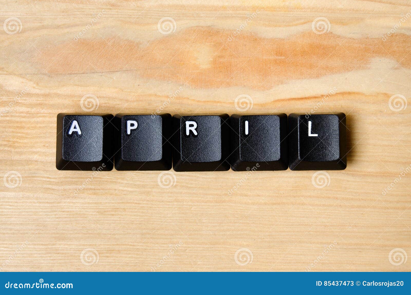 April word stock image. Image of buttons, wood, tech - 85437473