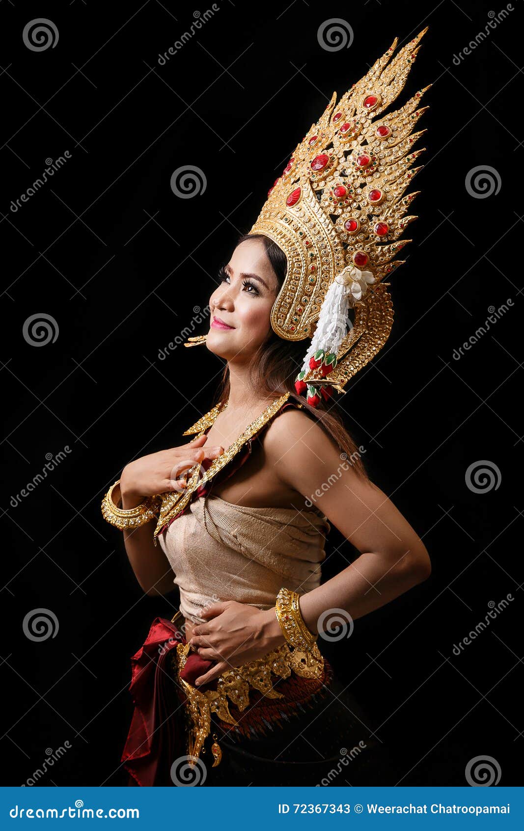 An Apsara Dancing Carved On The Sandstone Wall Background. Apsara Is A ...