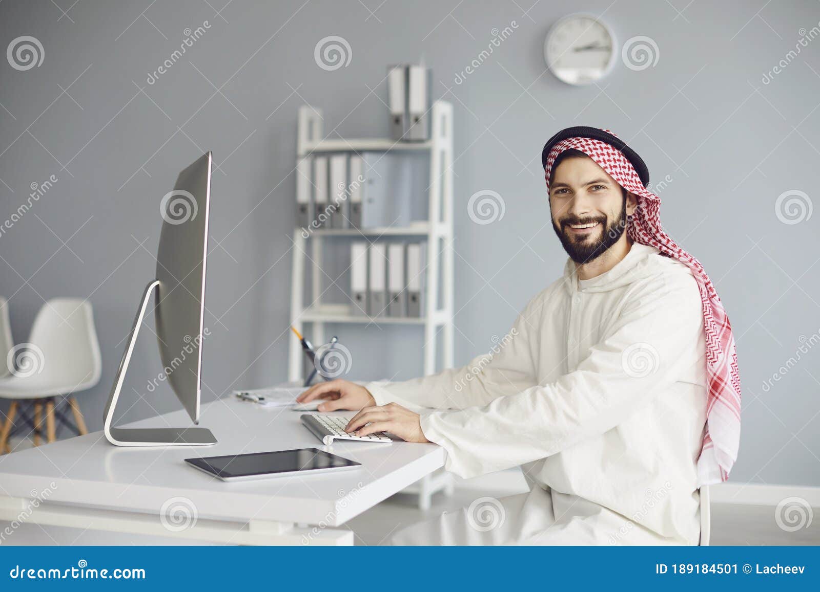 Arab Businessman Worker Works in Computer on the Workplace in the ...