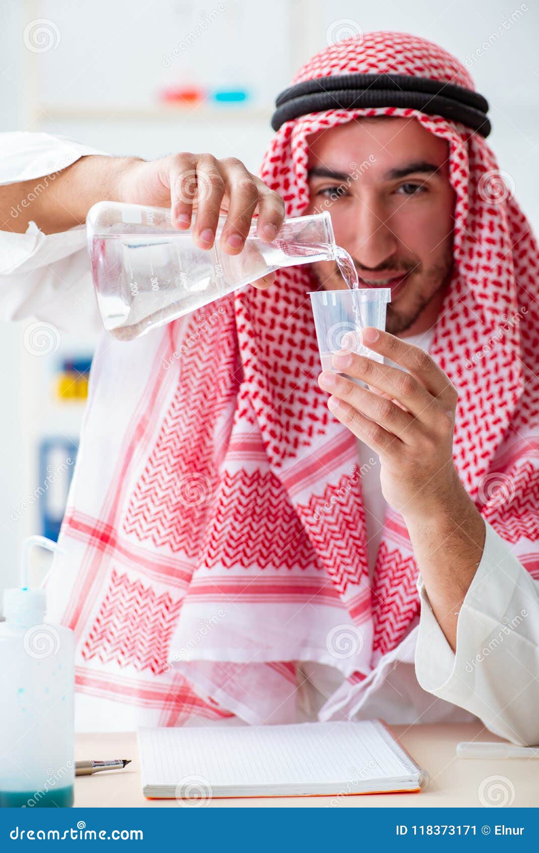 The Arab Chemist Checking the Quality of Drinking Water Stock Image ...