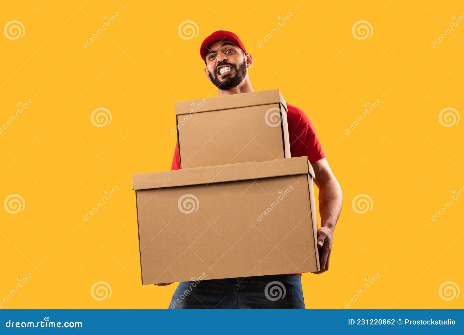 Arab Courier Guy Holding Stack Of Heavy Boxes, Yellow Background Stock ...