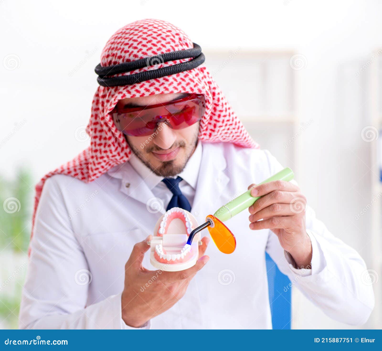 Arab Dentist Working on New Teeth Implant Stock Image - Image of dental ...