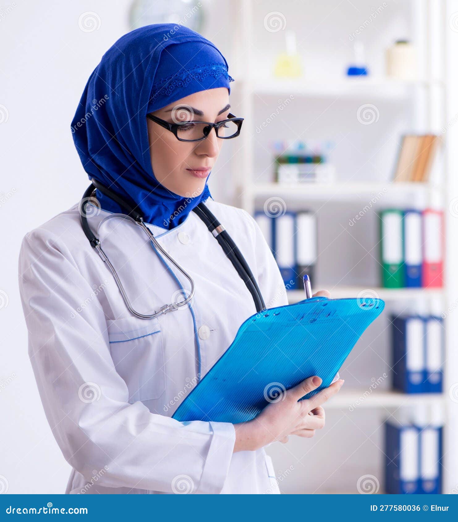 Arab Female Doctor Working in the Clinic Stock Photo - Image of clinic ...