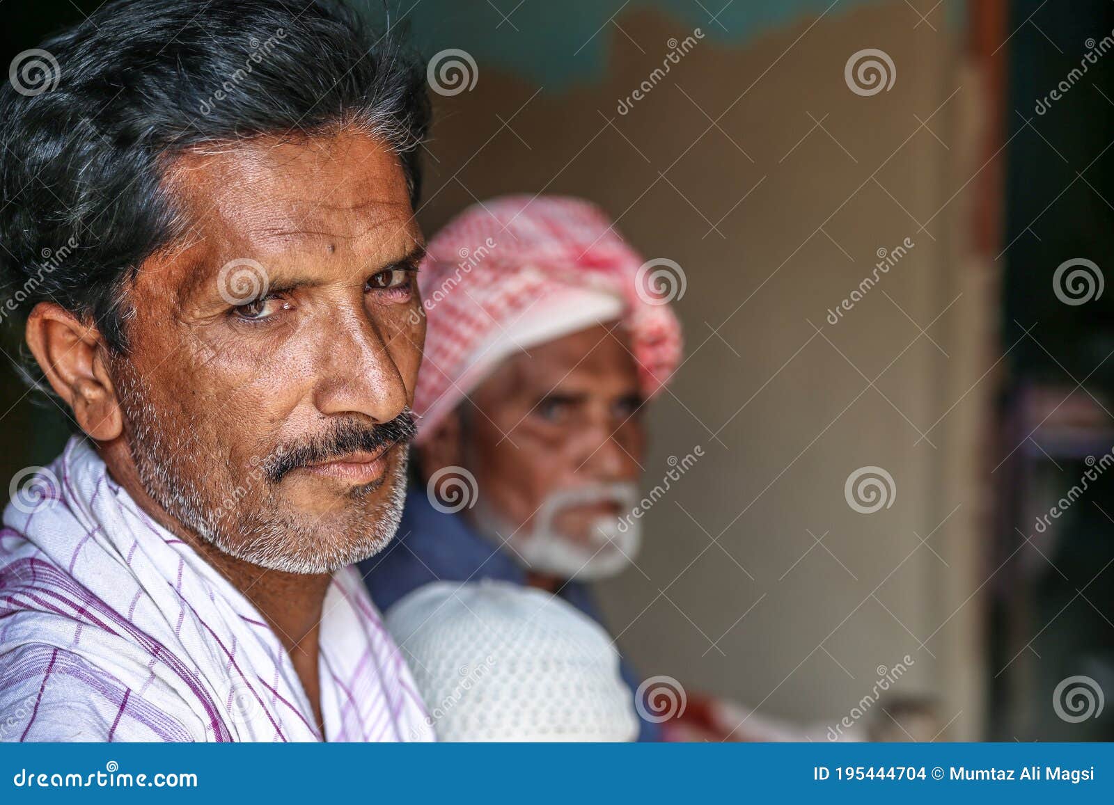 Arab Homeless Father and Son at a Refugee Camp with Sad Expression ...