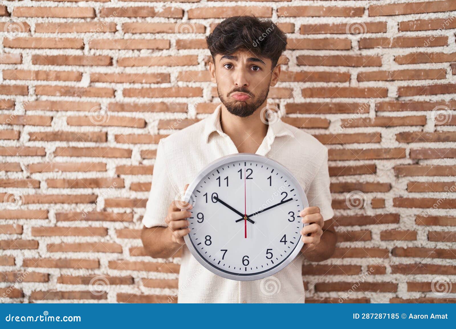 Arab Man with Beard Holding Big Clock Depressed and Worry for Distress ...