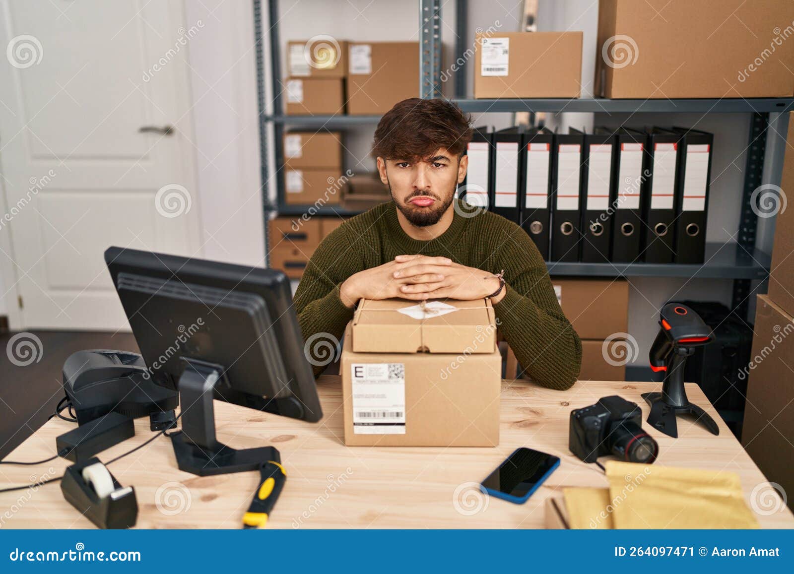 Arab Man with Beard Working at Small Business Ecommerce Depressed and ...