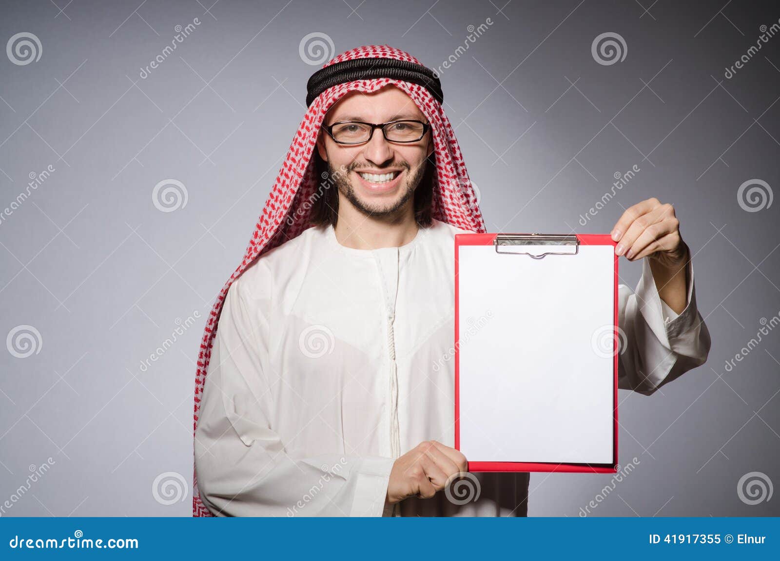 Arab man with paper stock image. Image of happy, board - 41917355