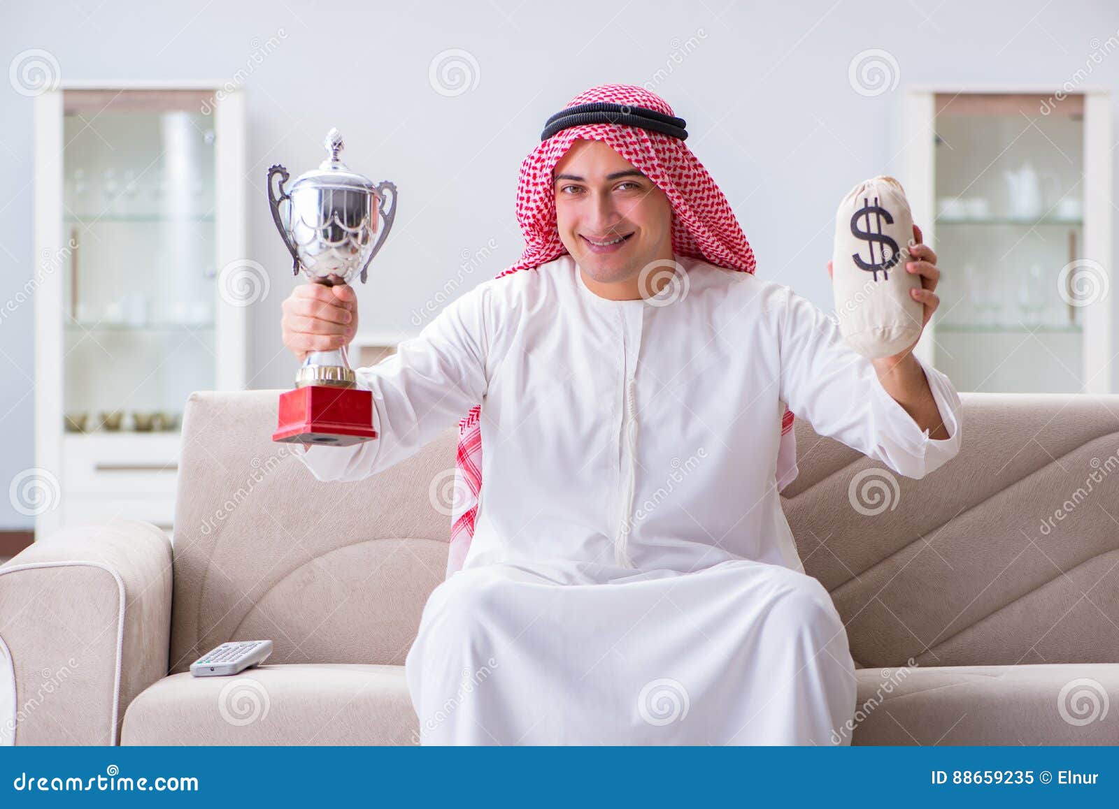 The Arab Man with Prize and Money on Sofa Stock Image - Image of male ...