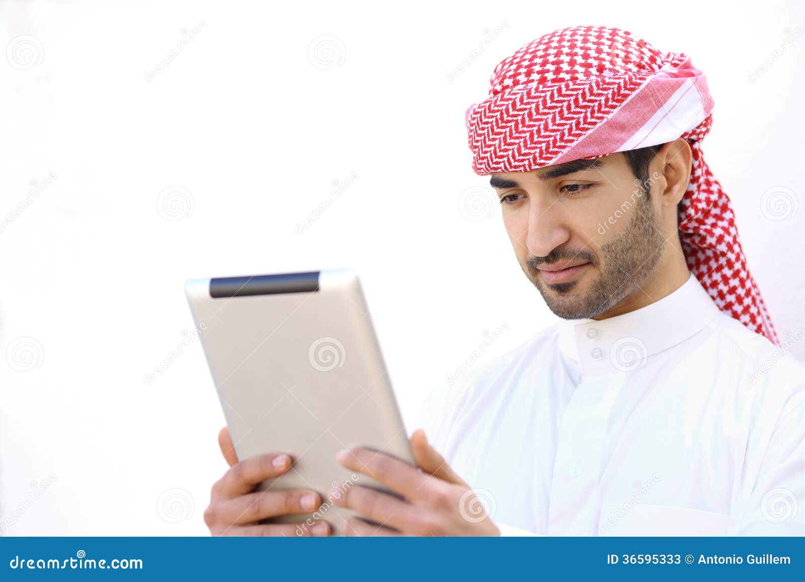 Arab Man Reading a Tablet Outdoor on White Stock Image - Image of ...