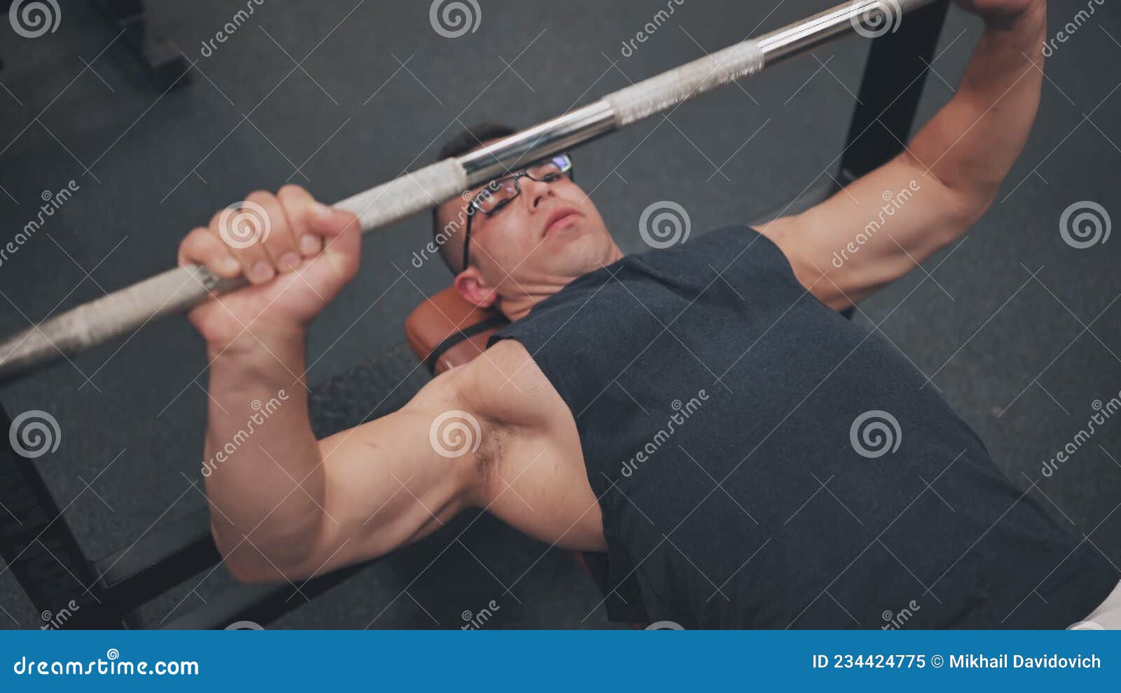 An Arab Man Shakes His Chest with a Barbell Lying Down. Stock Video ...