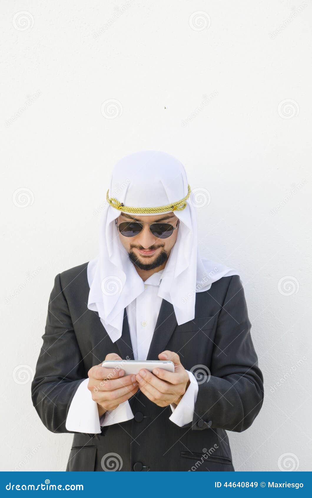 Arab Man Touching Smartphone Stock Image - Image of gulf, life: 44640849