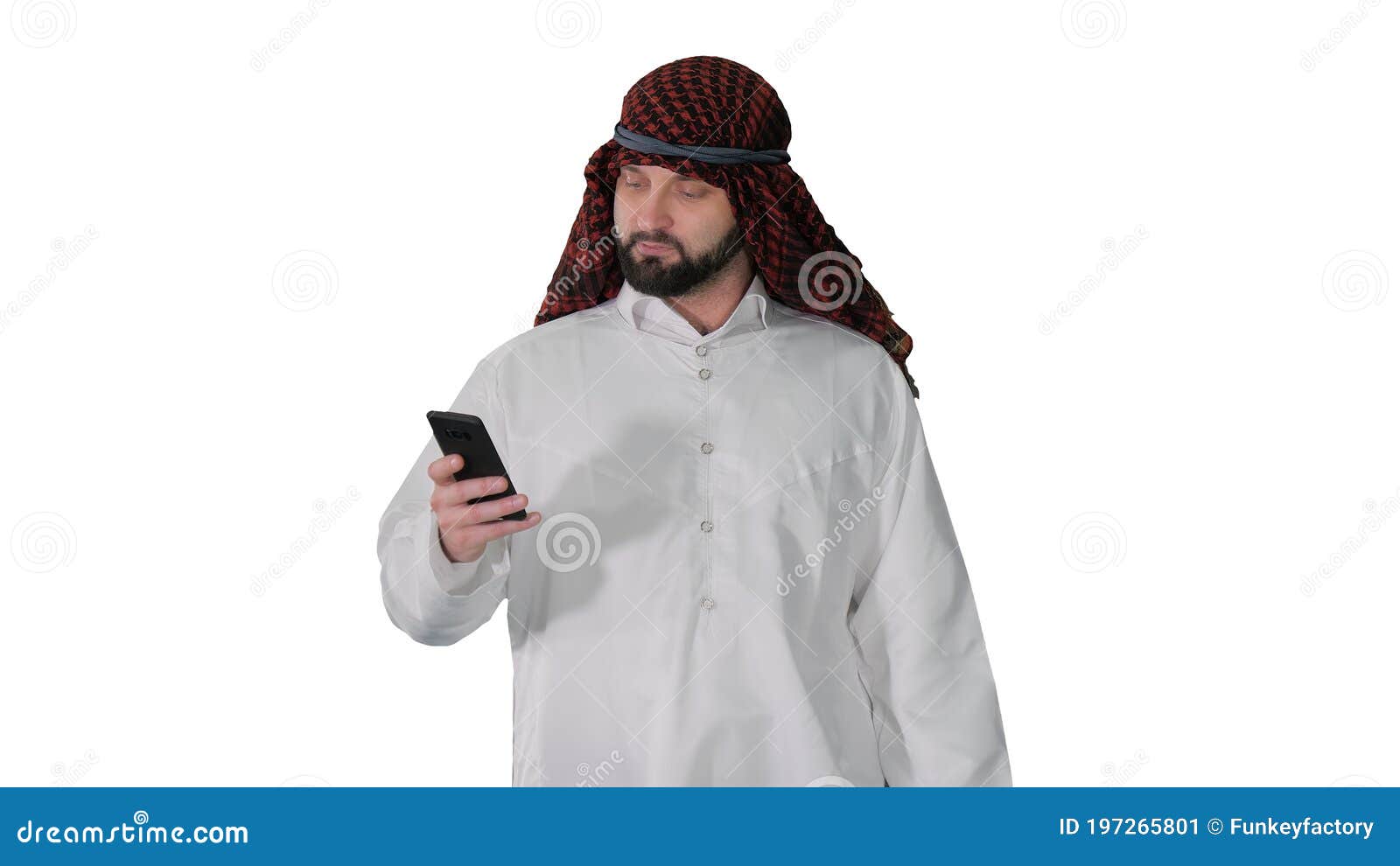 Arab Man Using His Smartphone Surfing on the Internet or Messagi Stock ...