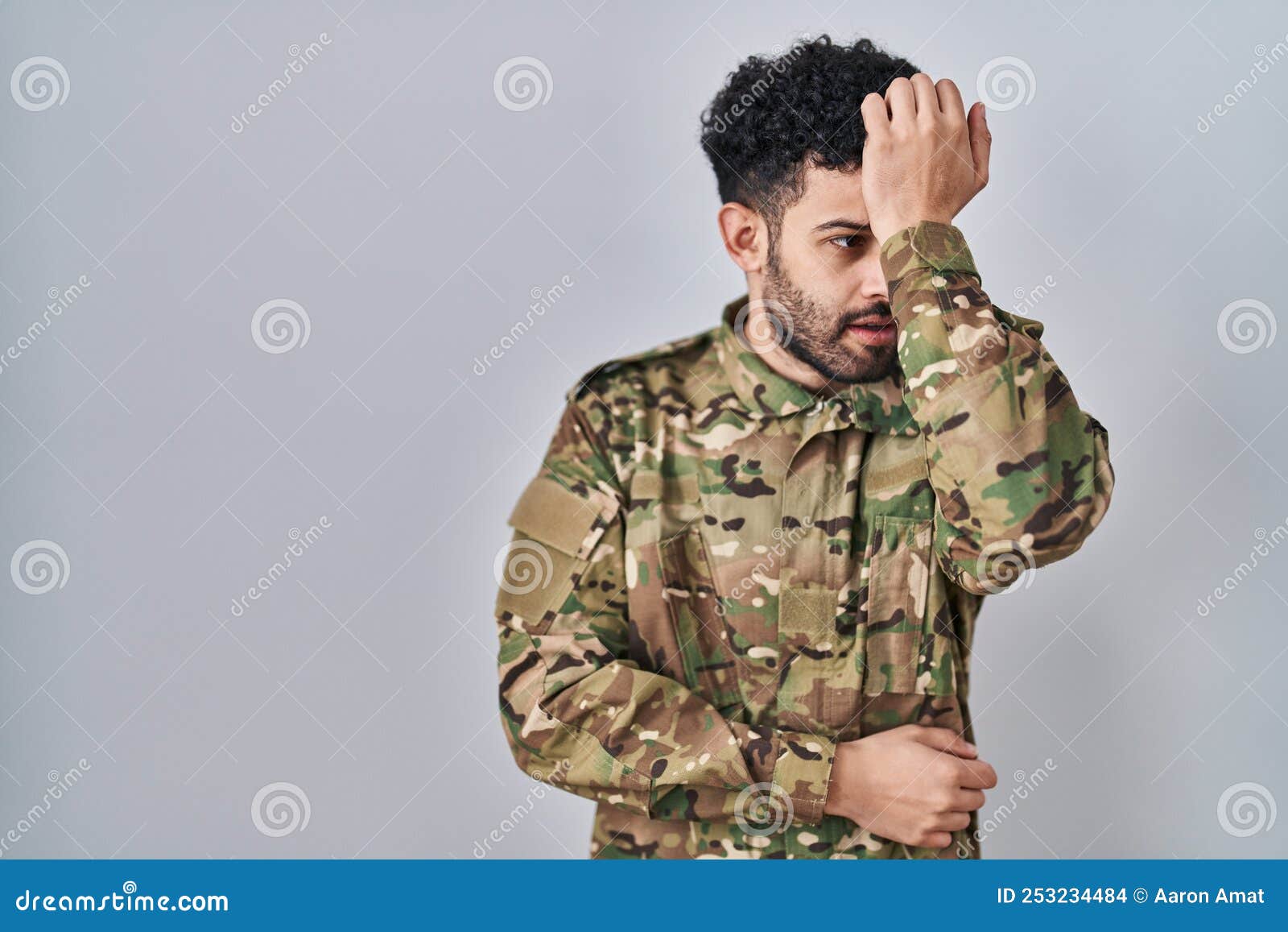 Arab Man Wearing Camouflage Army Uniform Surprised with Hand on Head ...