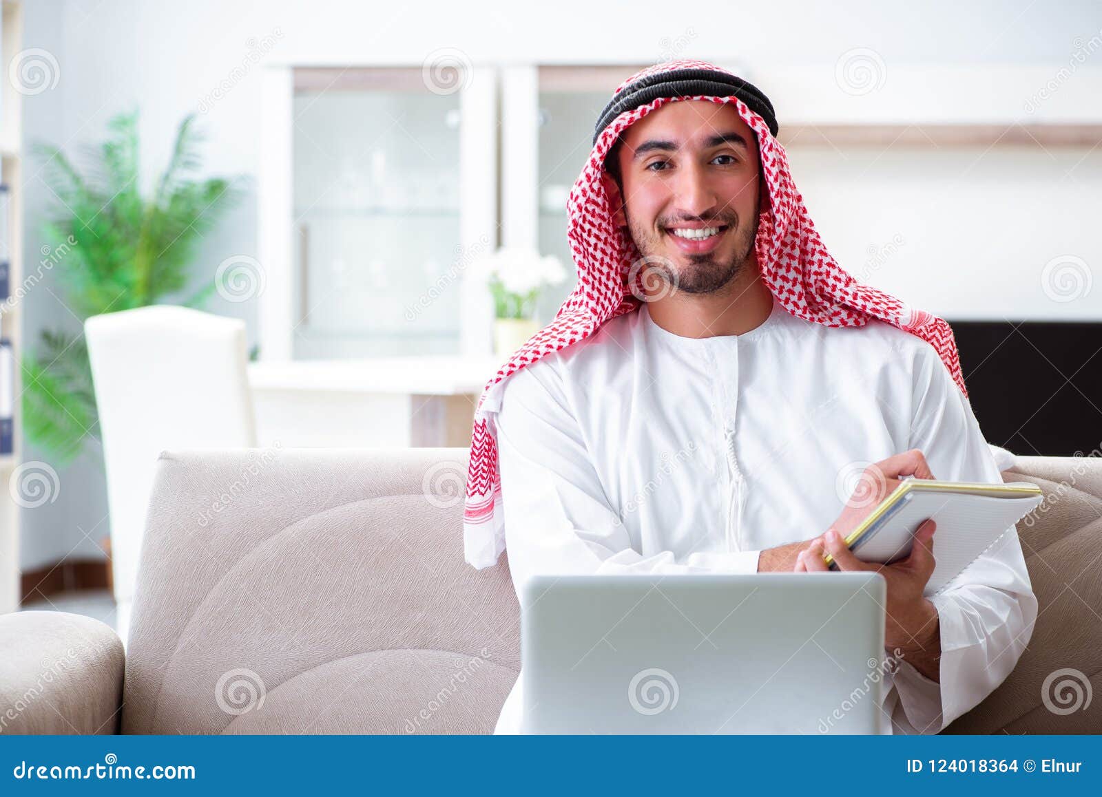 The Arab Man Working at Home on His Work Stock Photo - Image of making ...