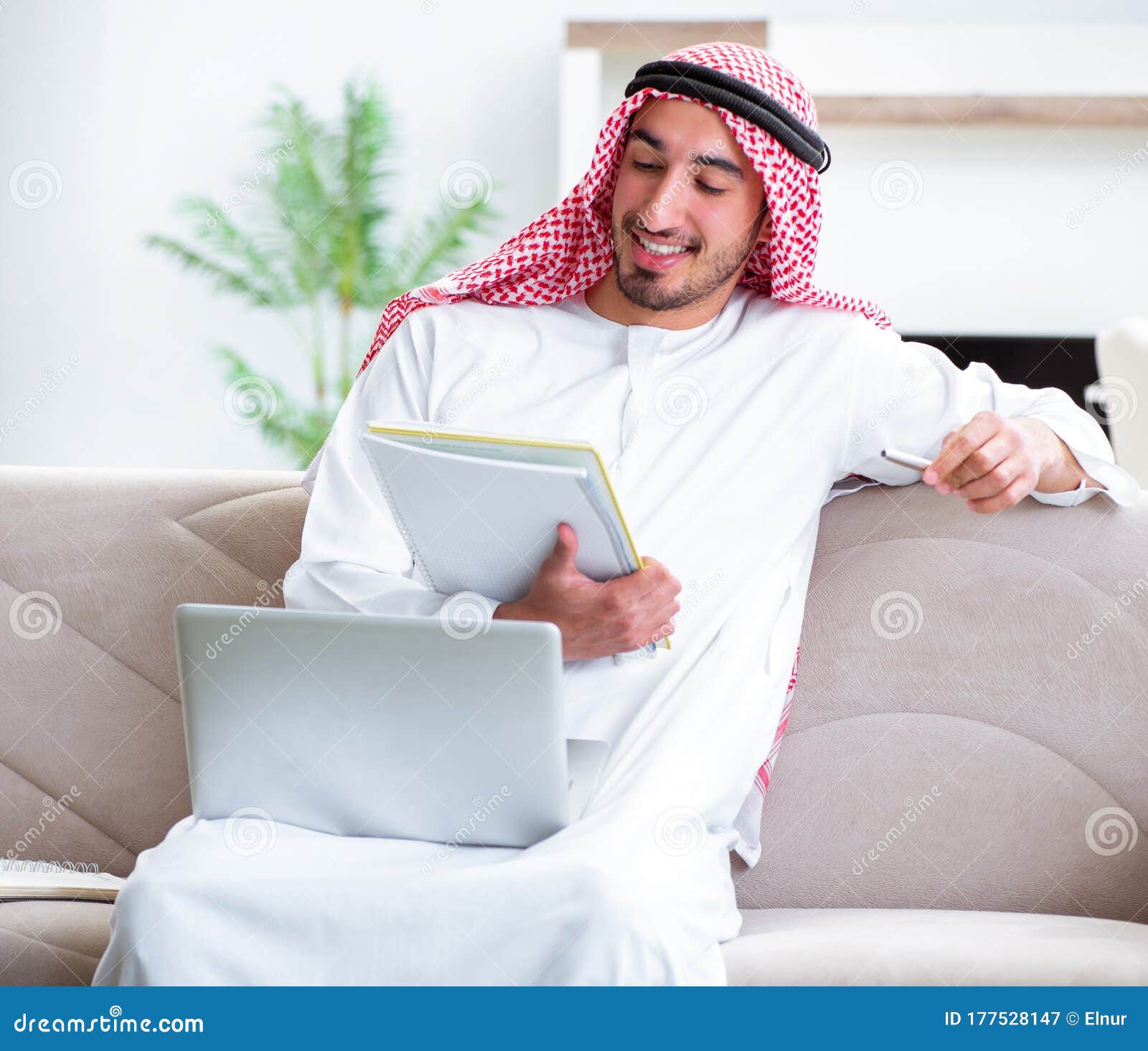 Arab Man Working at Home on His Work Stock Image - Image of freelancing ...