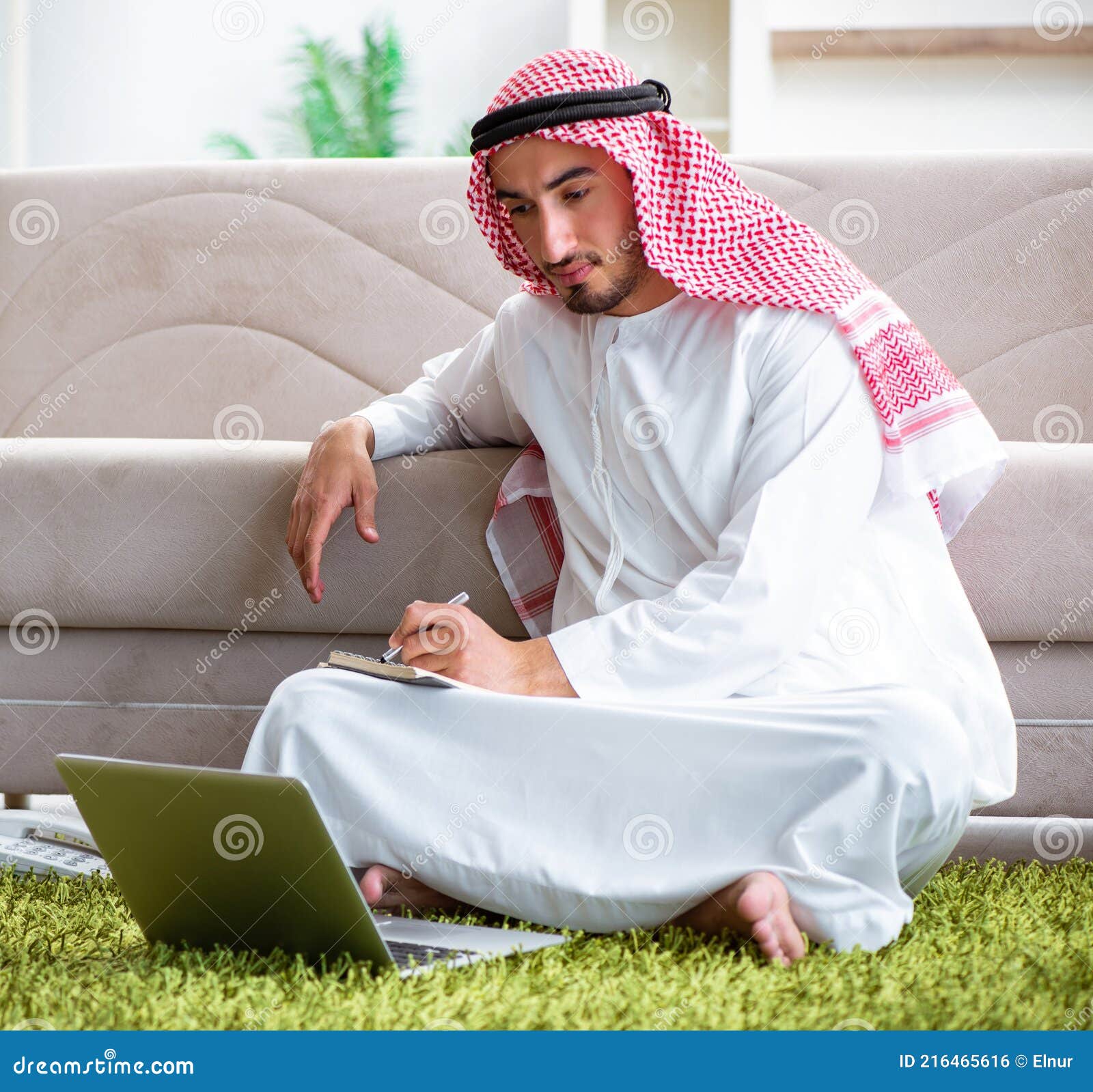 Arab Man Working at Home on His Work Stock Photo - Image of computer ...