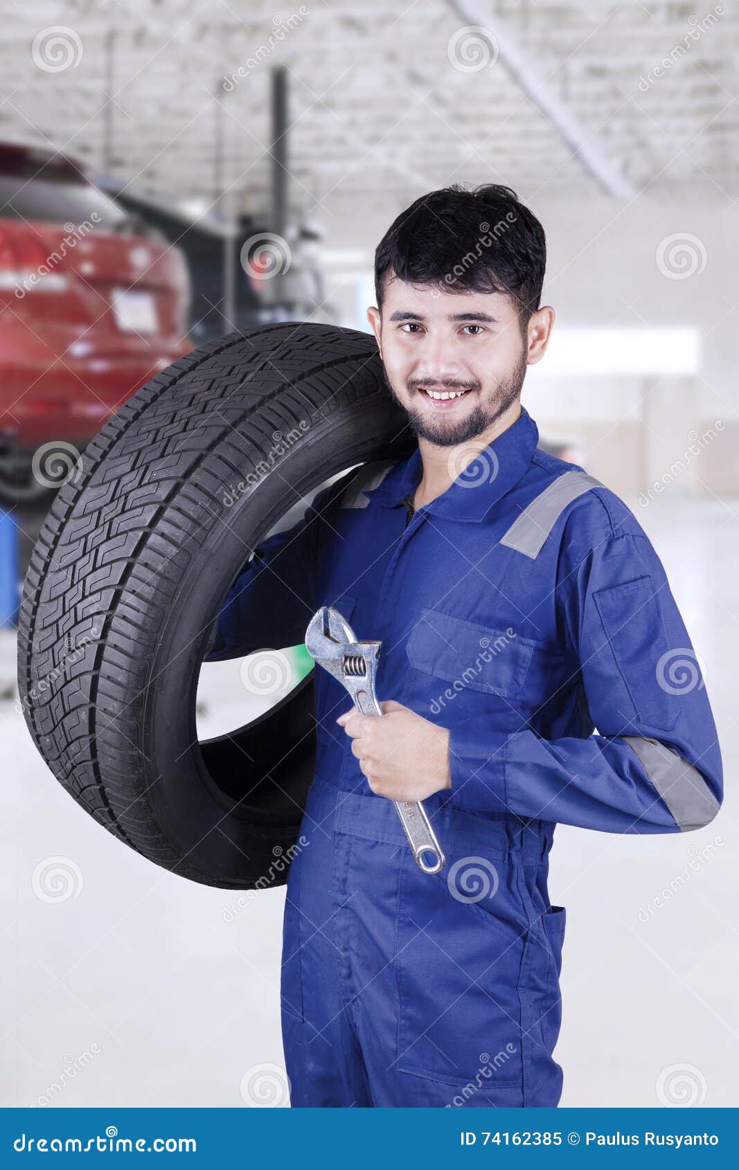 Arab Mechanic with Tire and Spanner Stock Image - Image of arab ...