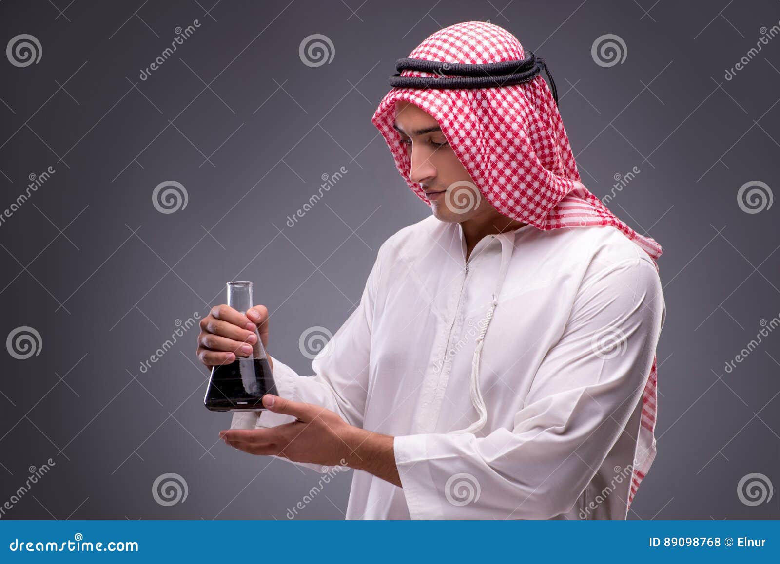 The Arab with Oil on Gray Background Stock Photo - Image of eastern ...