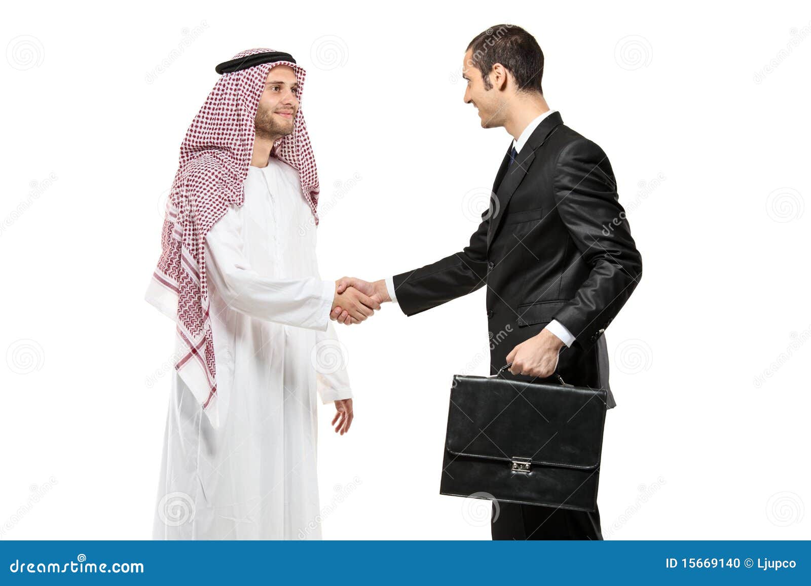 An Arab Person Shaking Hands with a Businessman Stock Photo - Image of ...