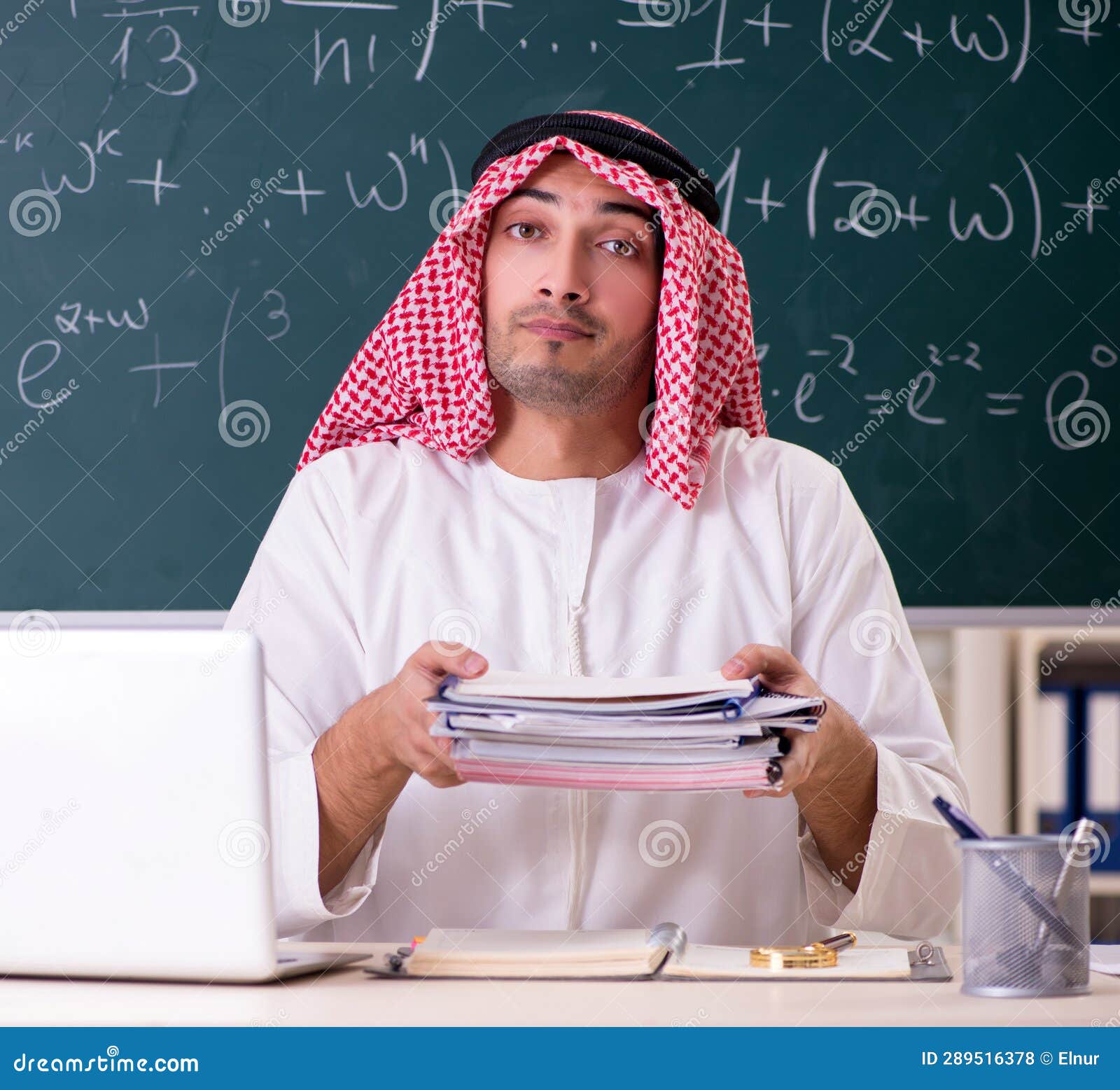Arab Teacher in Front of Chalkboard Stock Photo - Image of class ...
