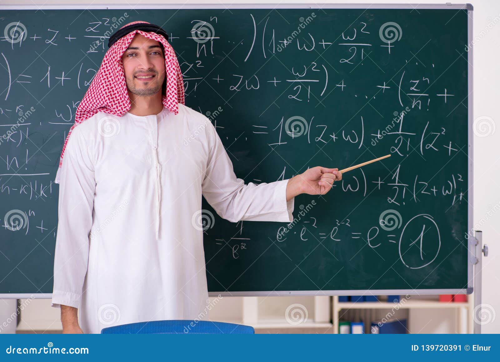 The Arab Teacher in Front of Chalkboard Stock Image - Image of muslim ...